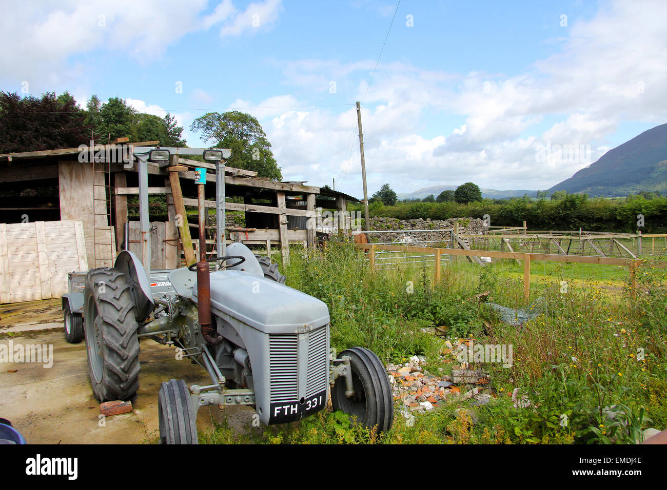 Grey tractor on farm Stock Photo - Alamy