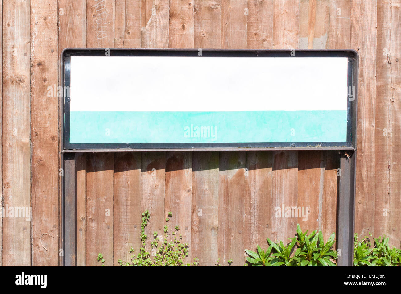 Empty road sign against wooden fence background London, UK Stock Photo ...