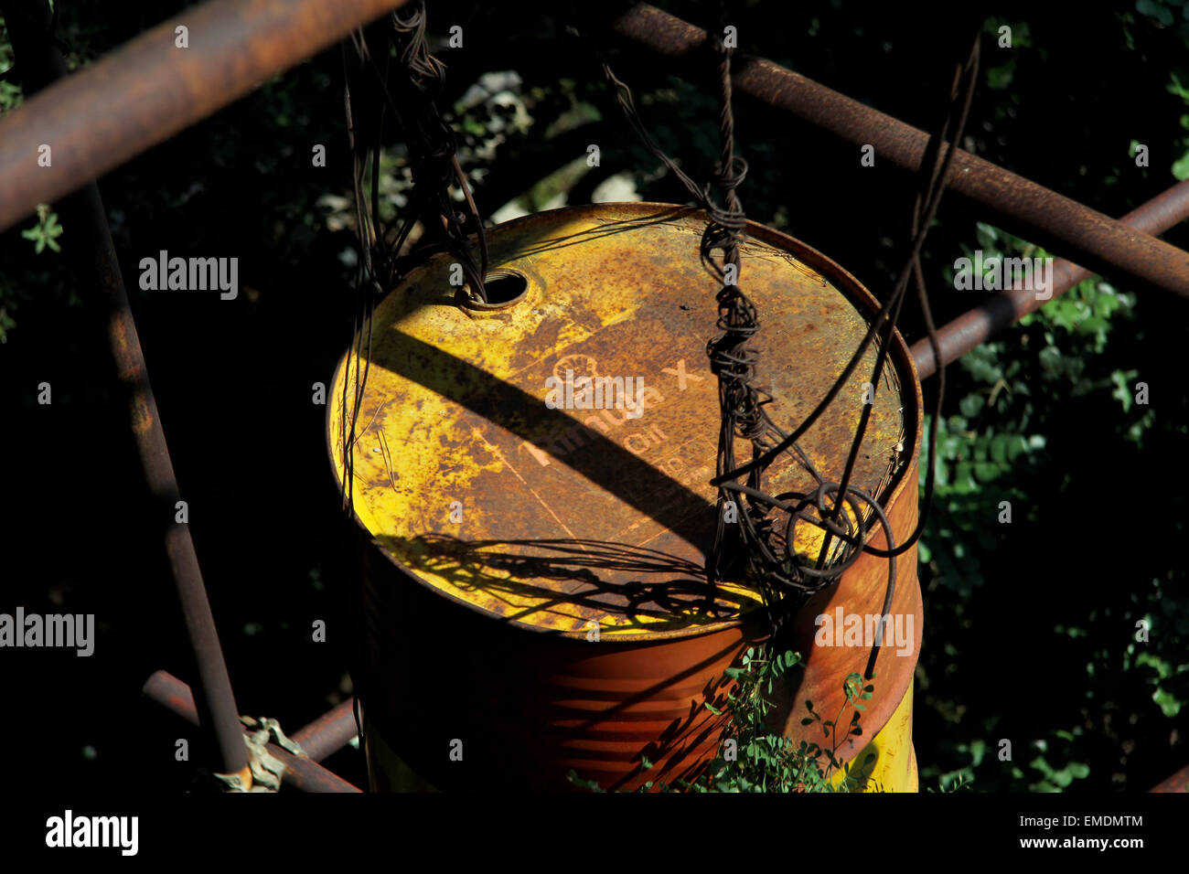 Rusted shell oil drum Stock Photo - Alamy