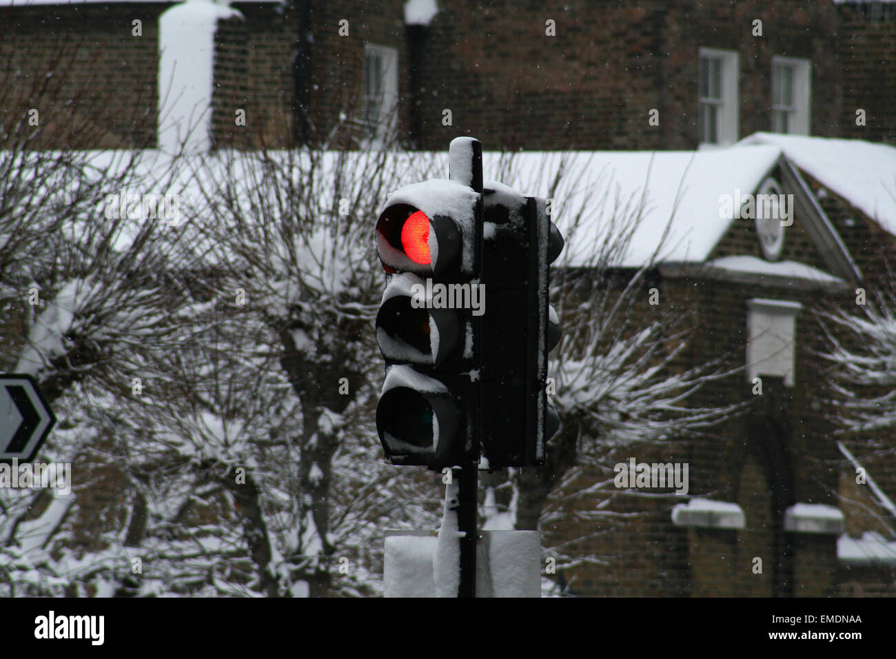 Snow on traffic light Stock Photo - Alamy
