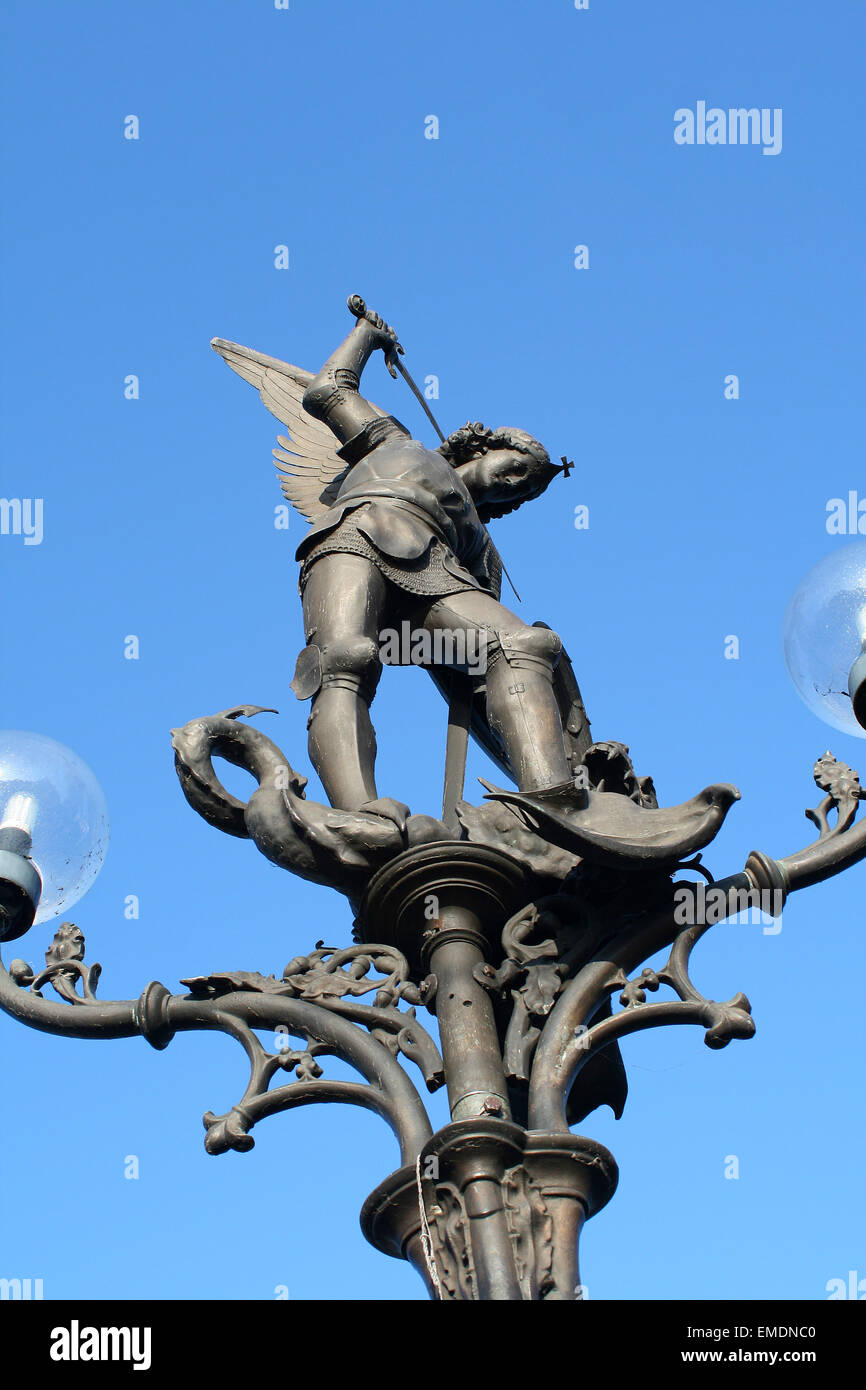 Statue on street lamp Stock Photo - Alamy