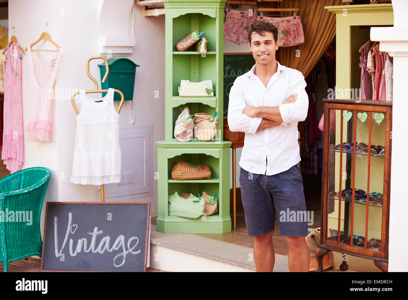 Male Owner Of Fashion Store Standing Outside Shop Stock Photo - Alamy