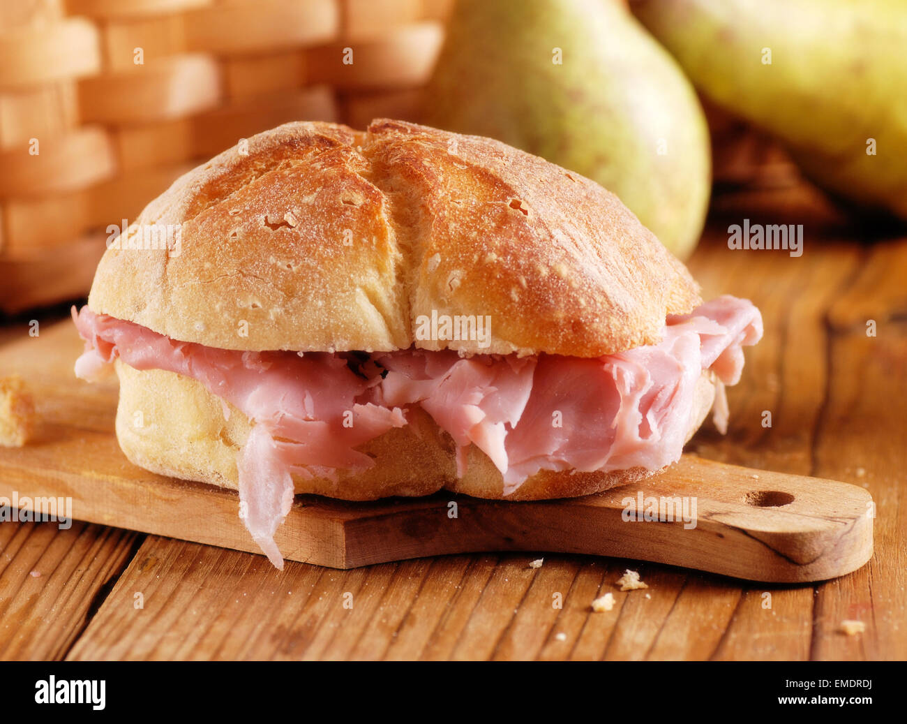 ham sandwich on wooden chopping board Stock Photo - Alamy