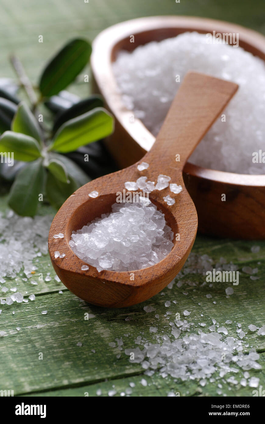 sea salt in wooden spoon Stock Photo - Alamy