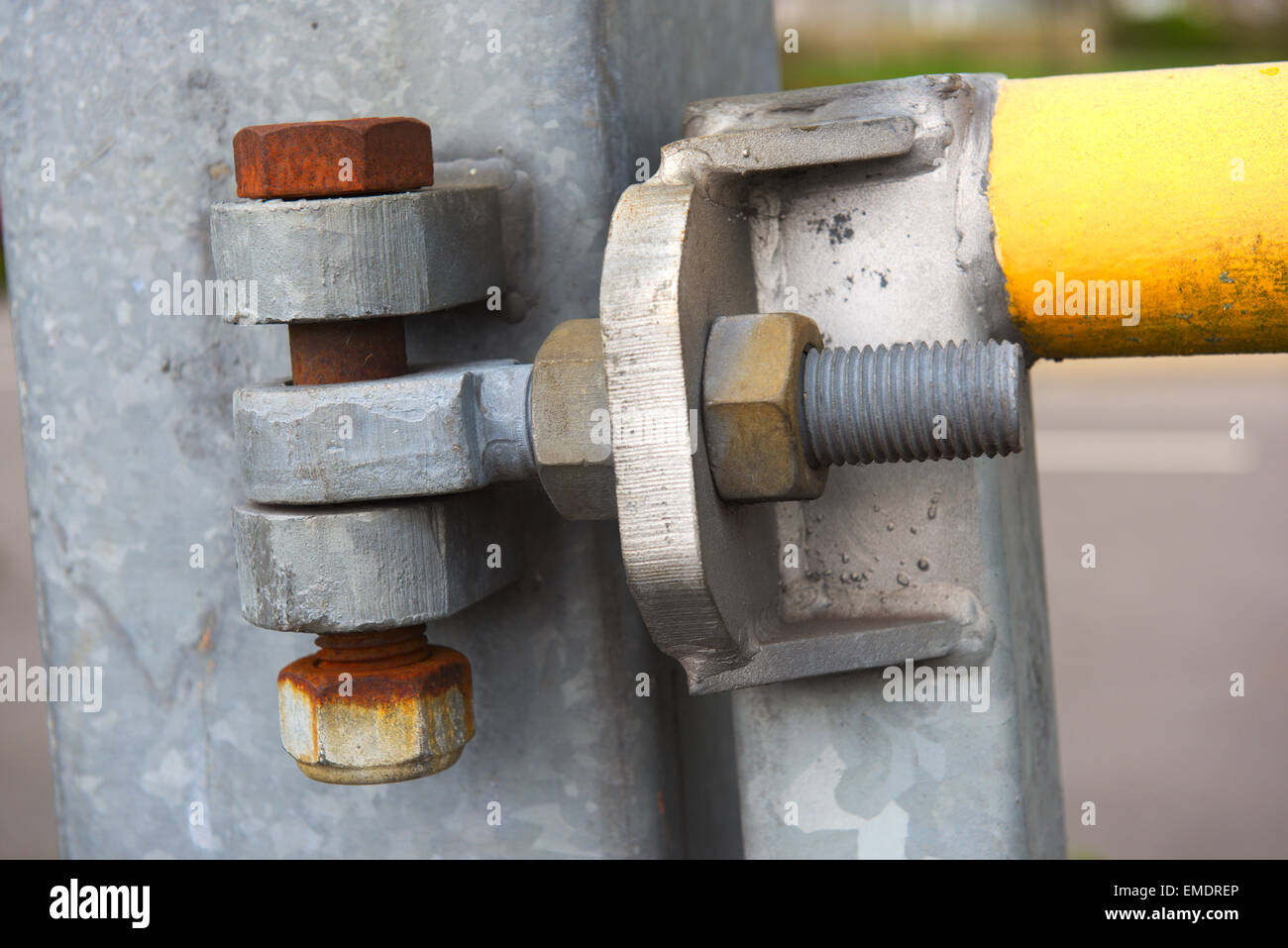 Simple heavy steel gate hinge Stock Photo - Alamy