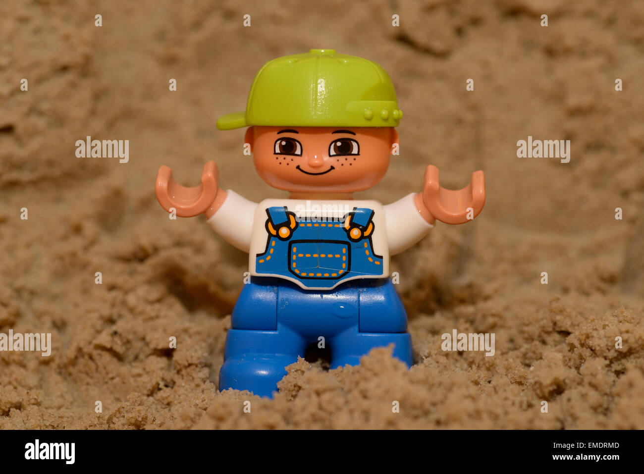 duplo lego style people in sand Stock Photo - Alamy