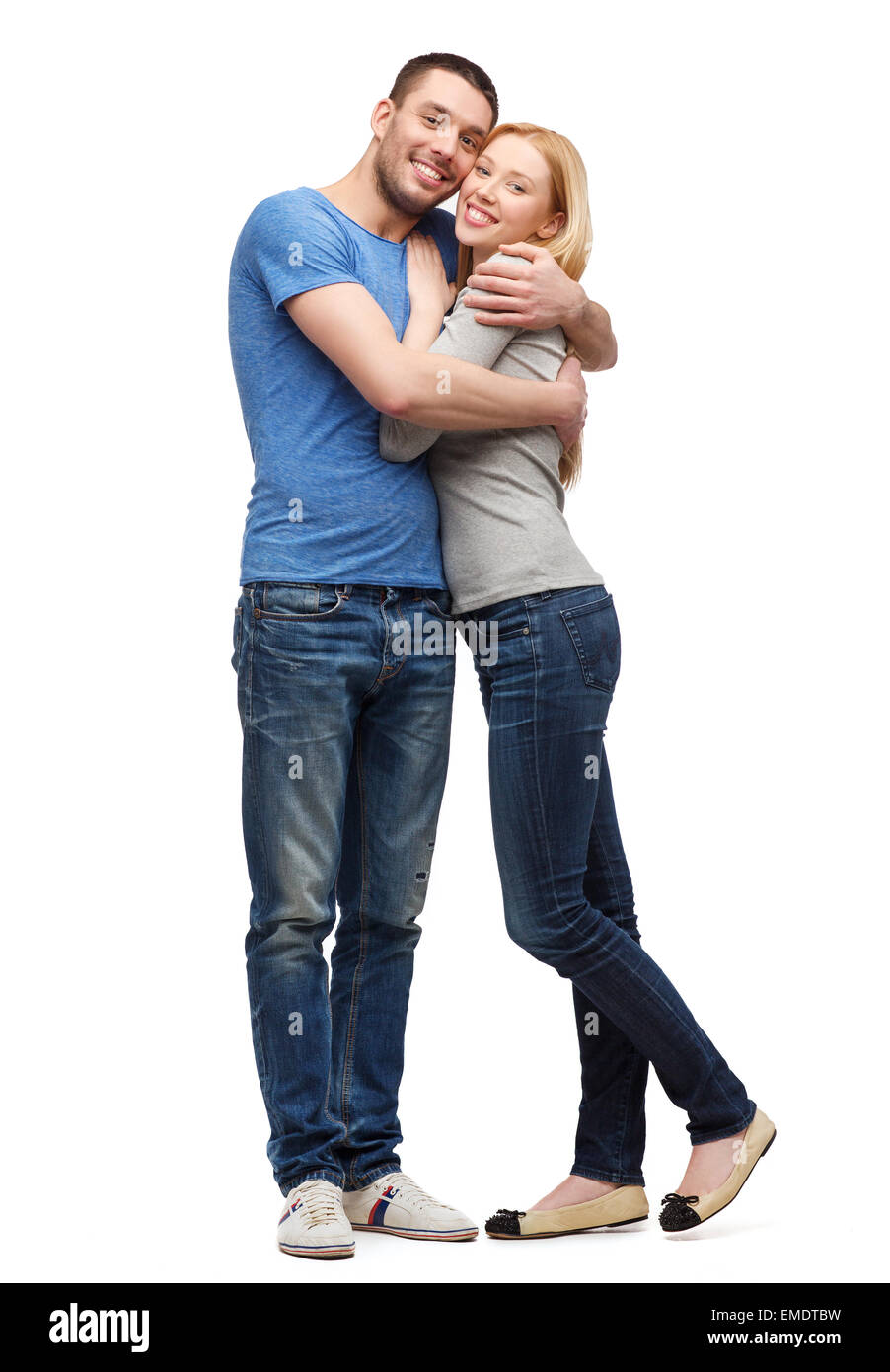 smiling couple hugging Stock Photo - Alamy