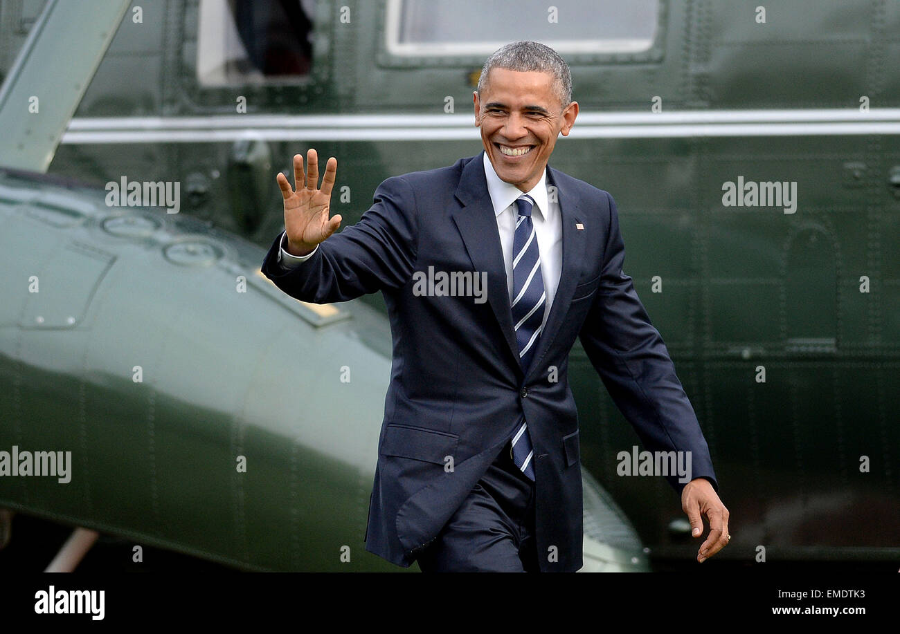 President Barack Obama waves as he returns to the White House after ...