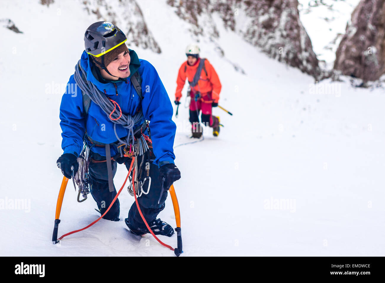 Ice climber smiling Stock Photo - Alamy