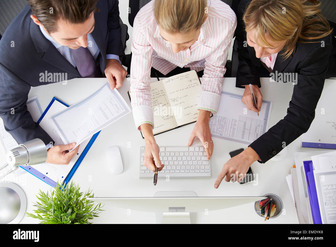 Overhead View Of Businesspeople Working At Office Computer Stock Photo ...