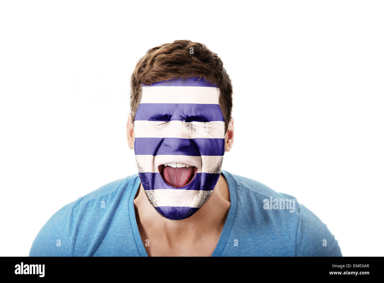 Screaming man with Greece flag on face Stock Photo - Alamy