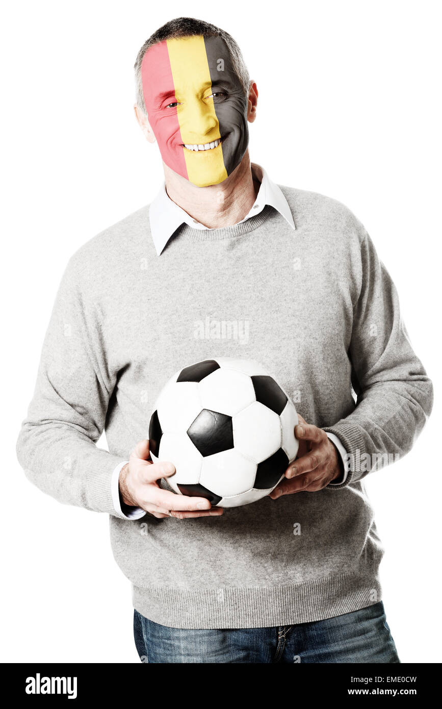 Mature man with Belgium flag on face Stock Photo - Alamy