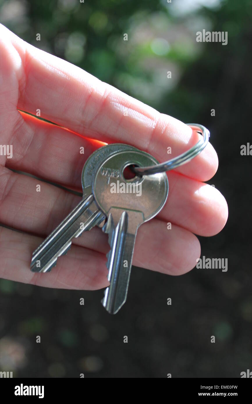 hands holds door key Stock Photo - Alamy