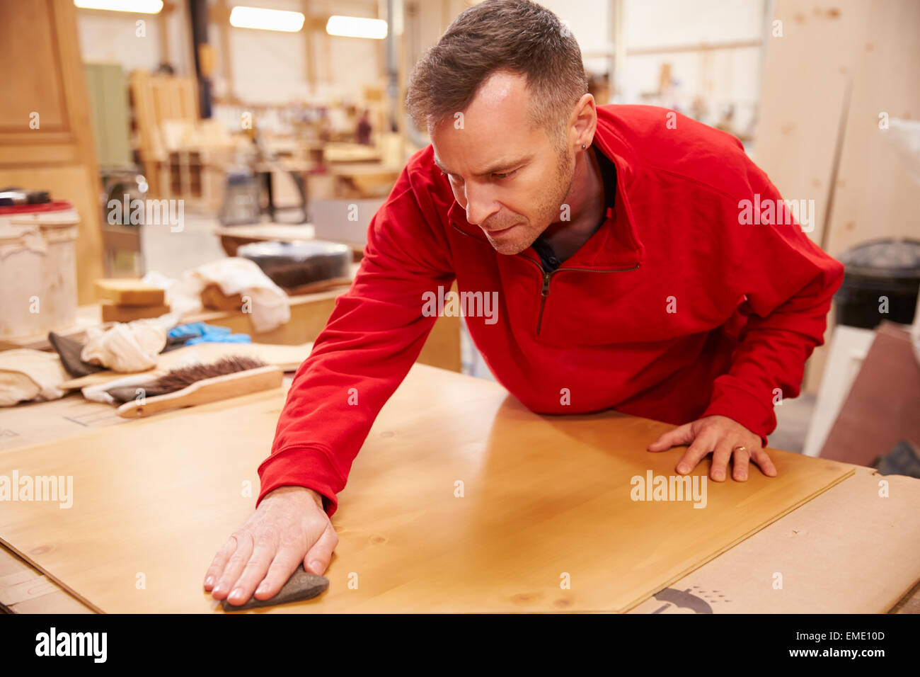 Carpenter Finishing Wood In Carpentry Workshop Stock Photo - Alamy