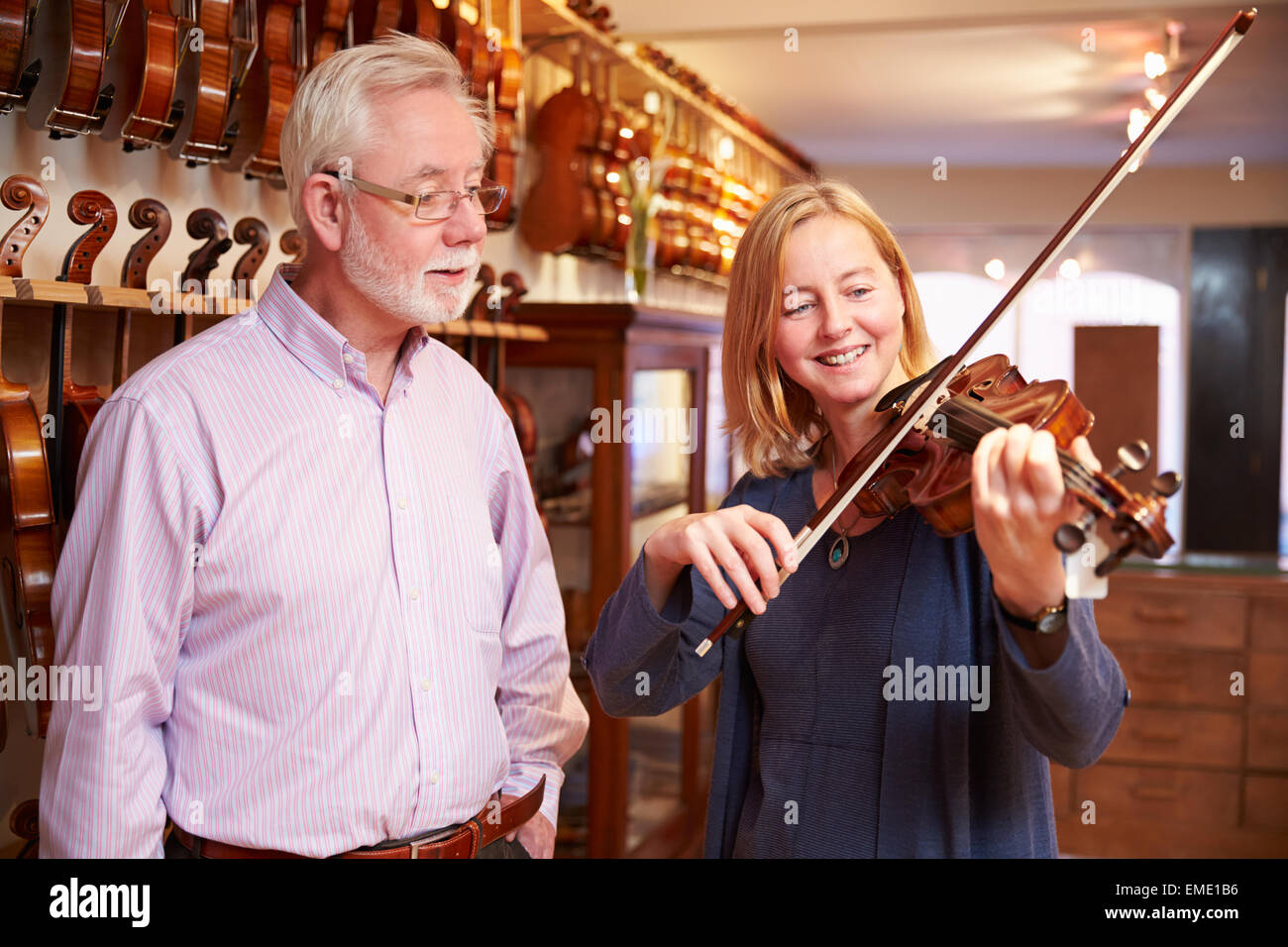Music store customer hi-res stock photography and images - Alamy
