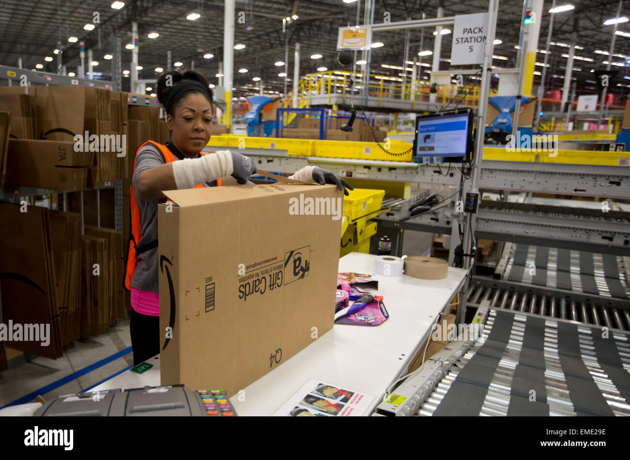 woman employee working at the 1.25 million square foot Amazon shipping ...