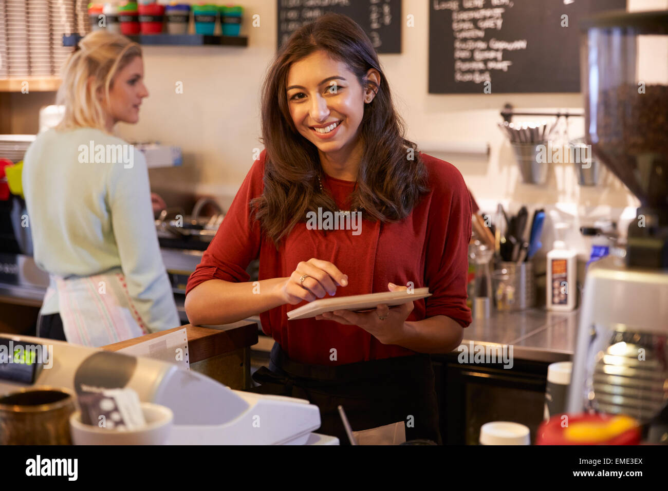 Portrait Of Two Women Running Coffee Shop Together Stock Photo - Alamy