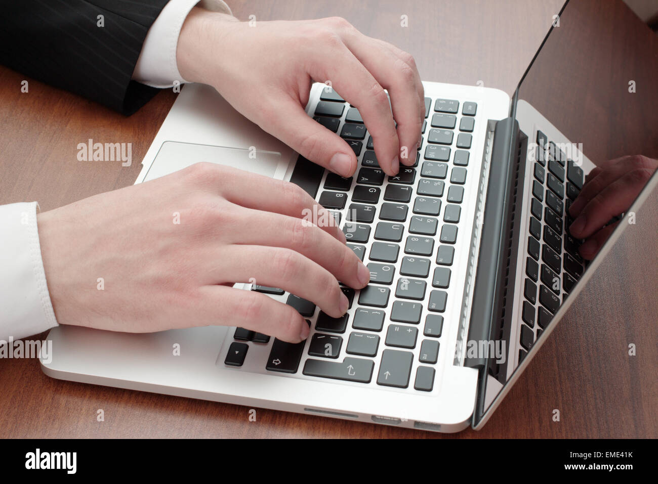 Businessman working on a computer, hands and keyboard Stock Photo - Alamy