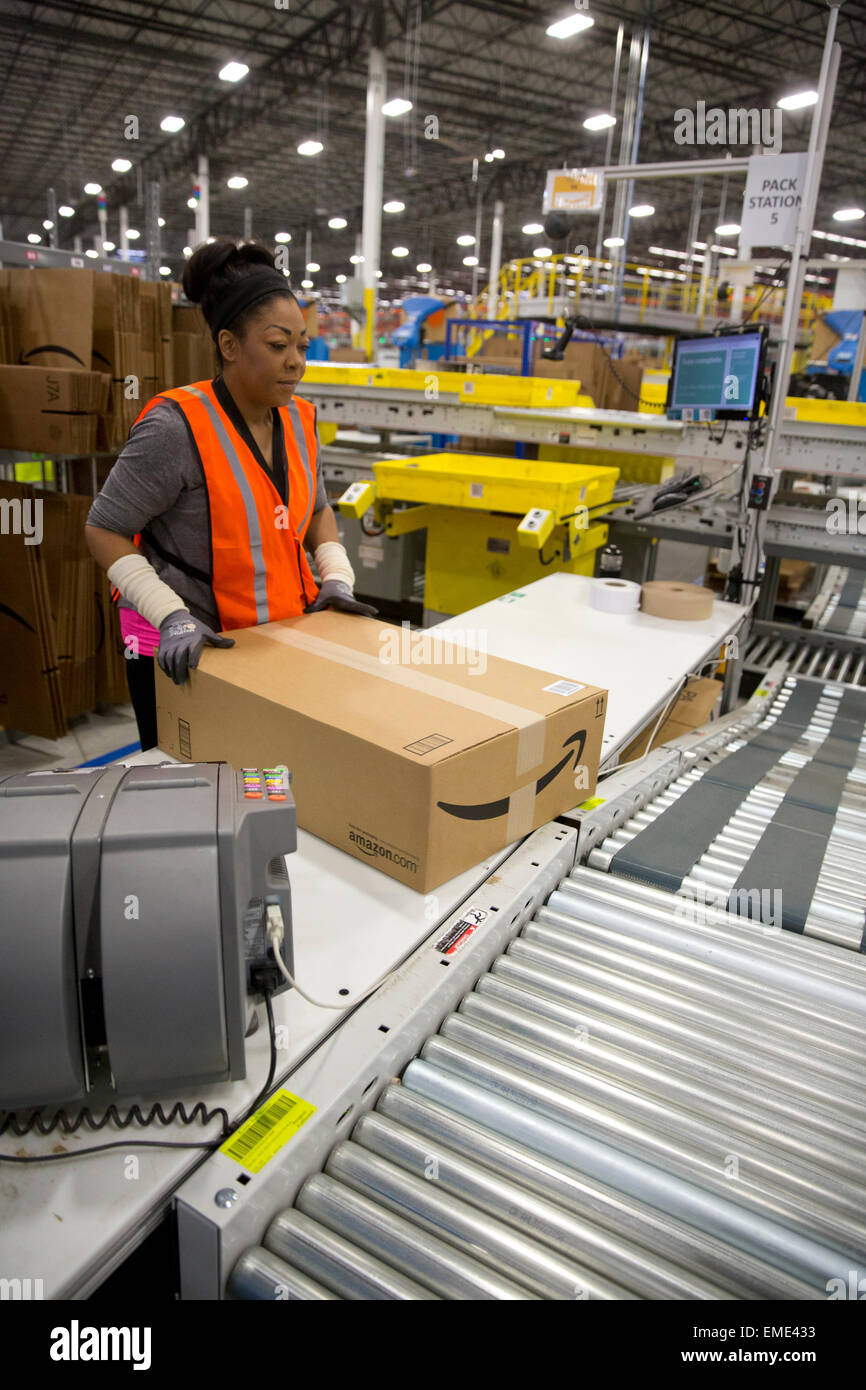 woman employee working at the 1.25 million square foot Amazon shipping ...