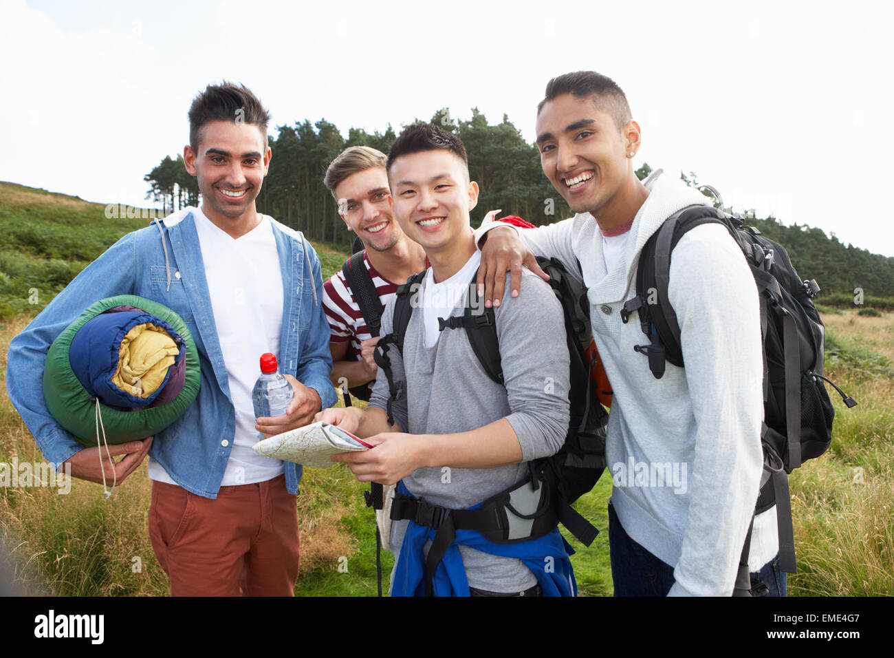 Group Of Young Men On Camping Trip In Countryside Stock Photo - Alamy
