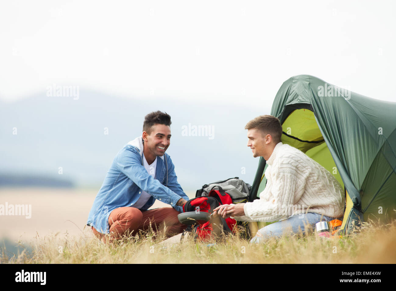 Two Young Men On Camping Trip In Countryside Stock Photo - Alamy
