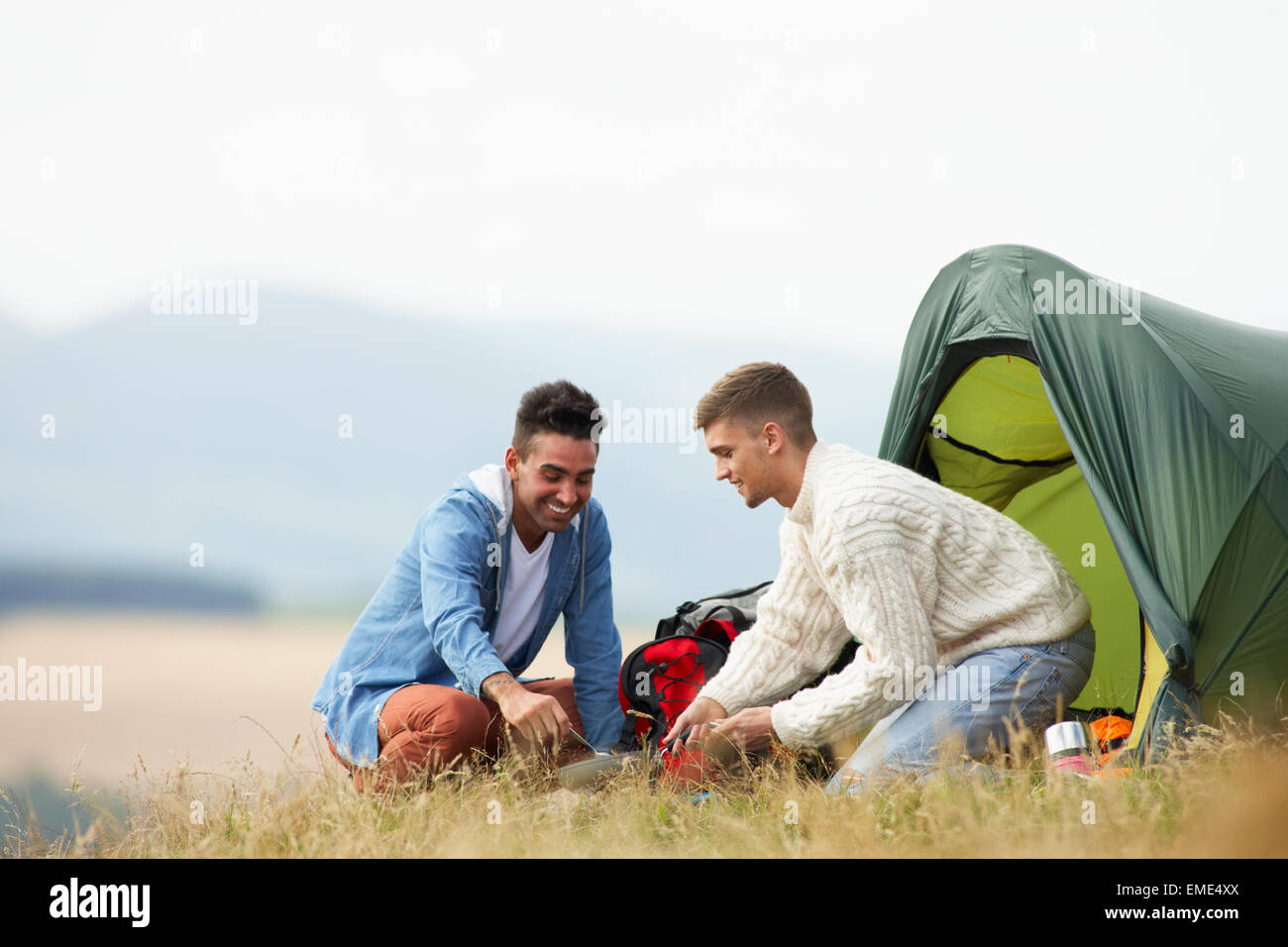 Two Young Men On Camping Trip In Countryside Stock Photo - Alamy