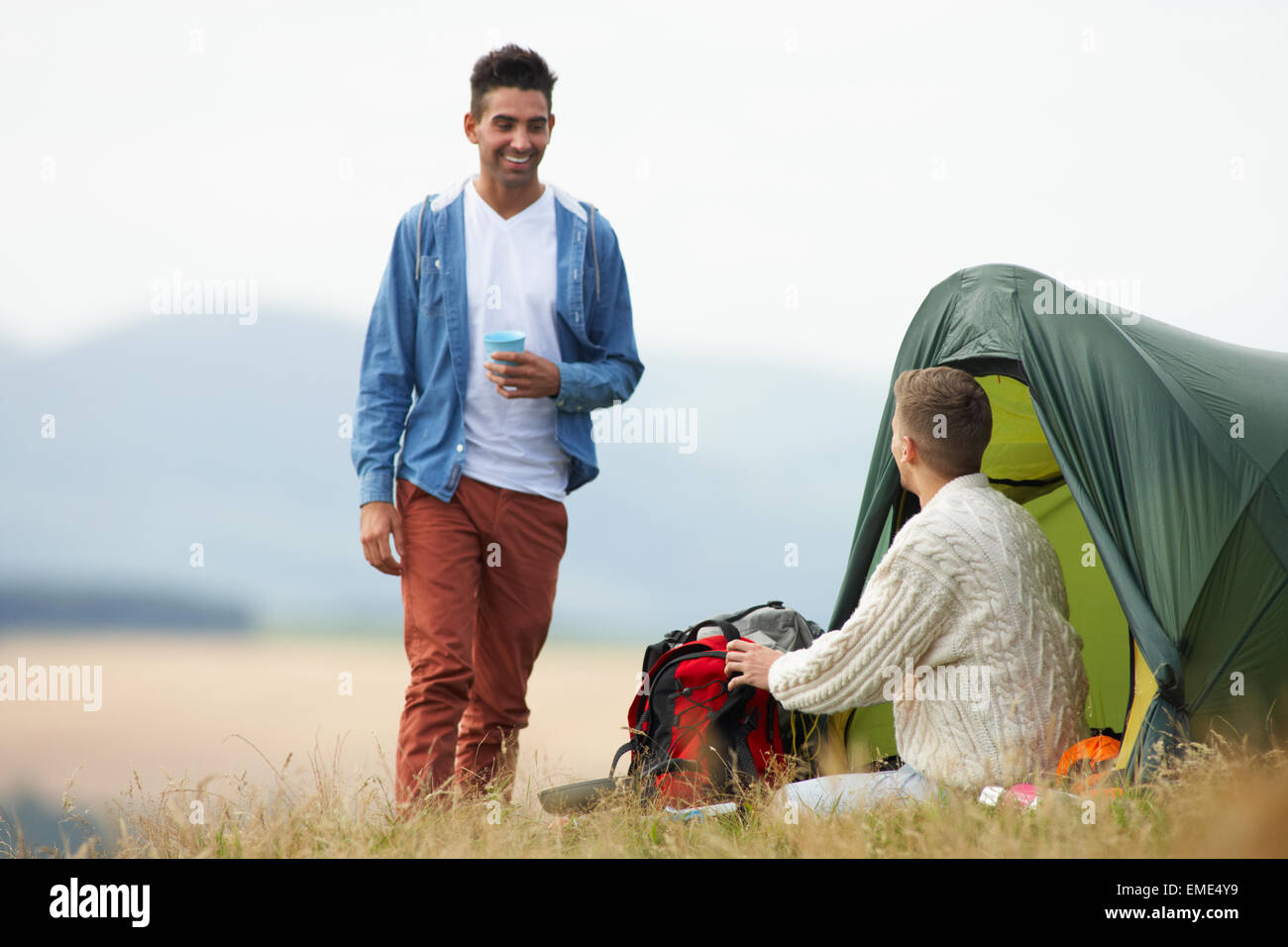Two Young Men On Camping Trip In Countryside Stock Photo - Alamy
