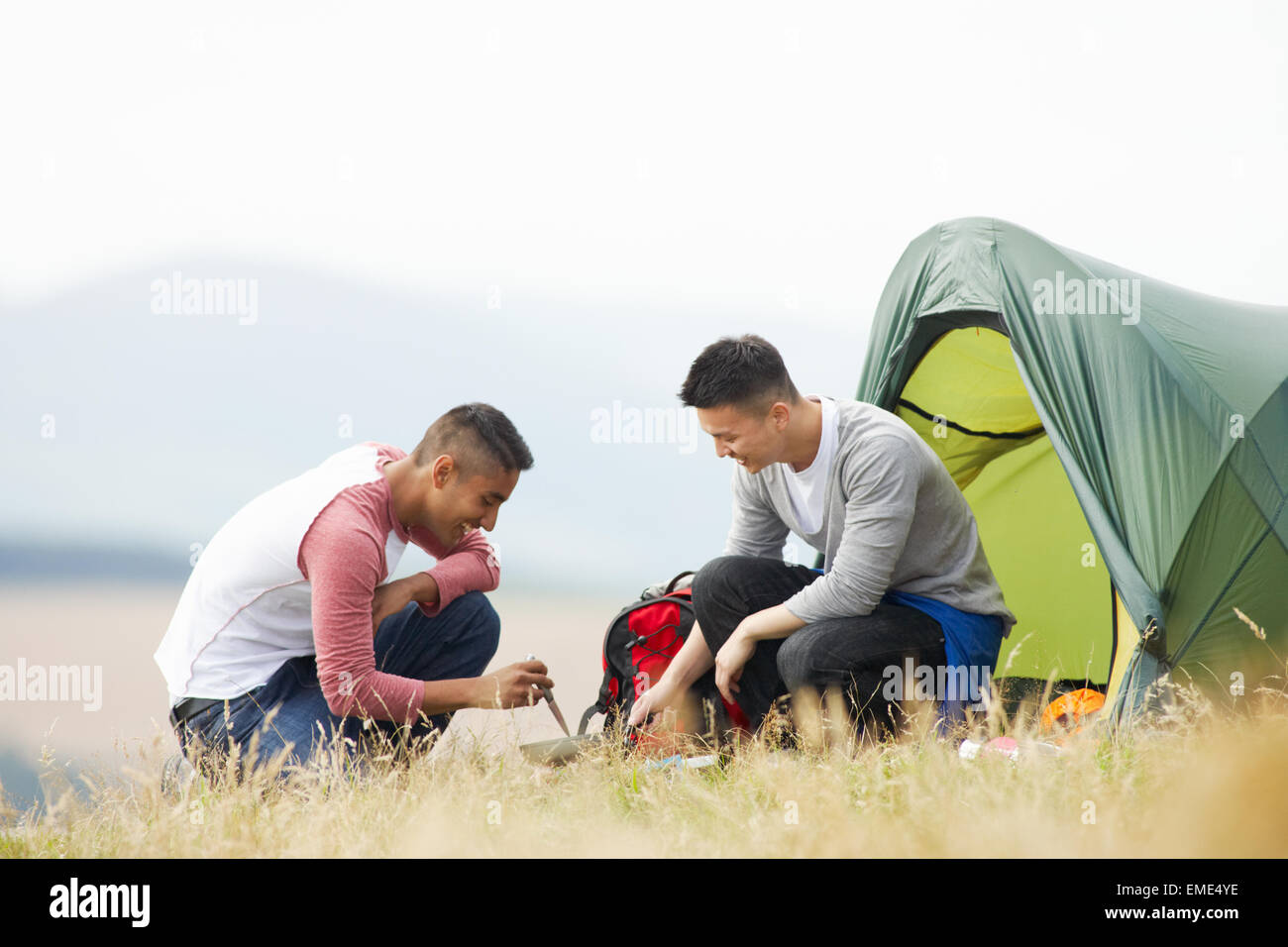 Two Young Men On Camping Trip In Countryside Stock Photo - Alamy