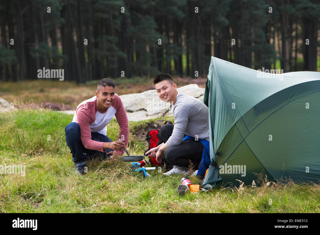 Two Young Men On Camping Trip In Countryside Stock Photo - Alamy