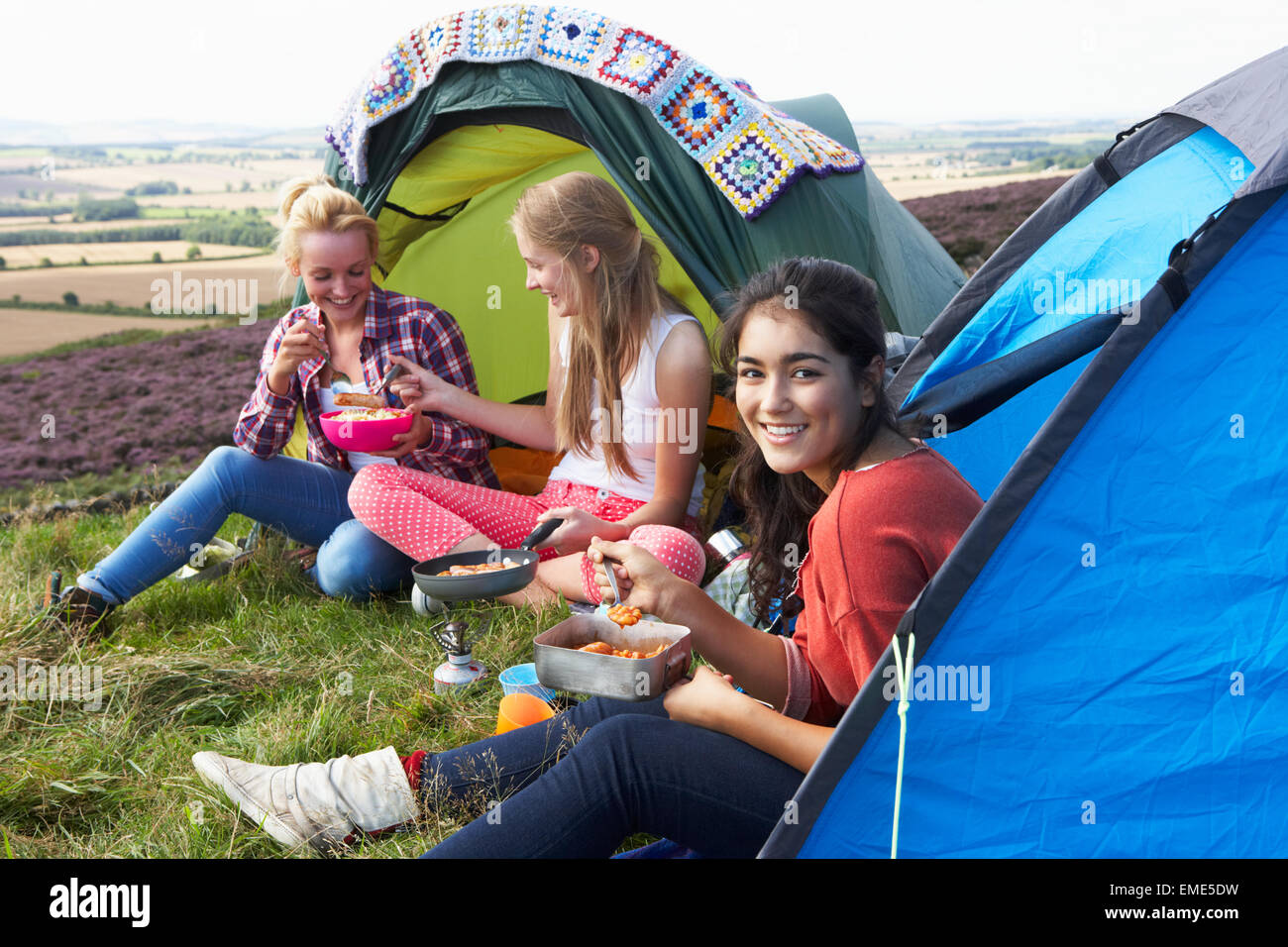 Group Of Teenage Girls On Camping Trip In Countryside Stock Photo - Alamy