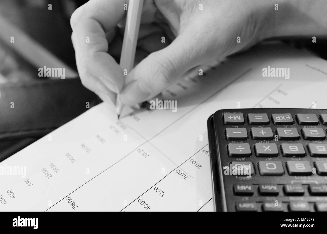 Bank statement with pencil and calculator Stock Photo - Alamy