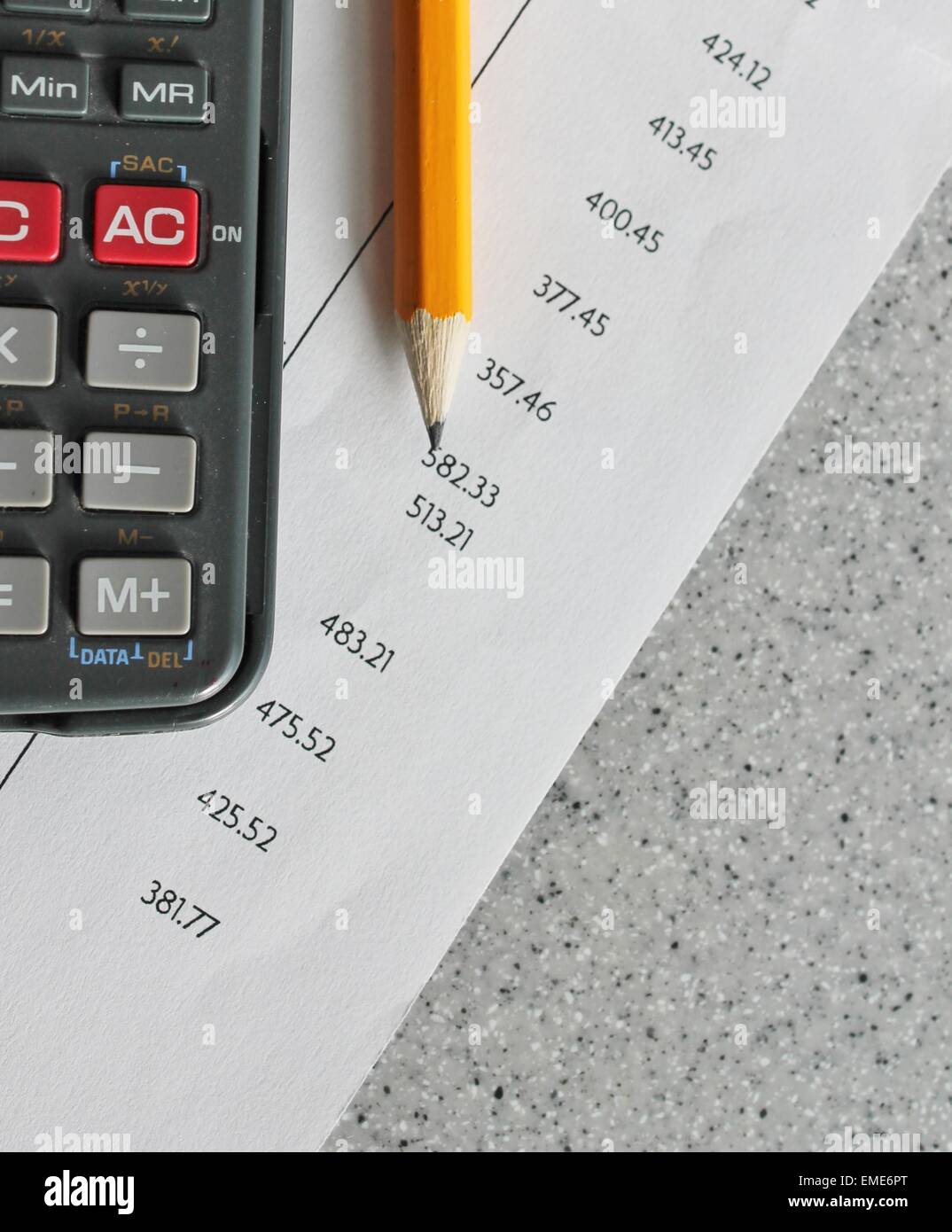 Bank statement with pencil and calculator Stock Photo - Alamy