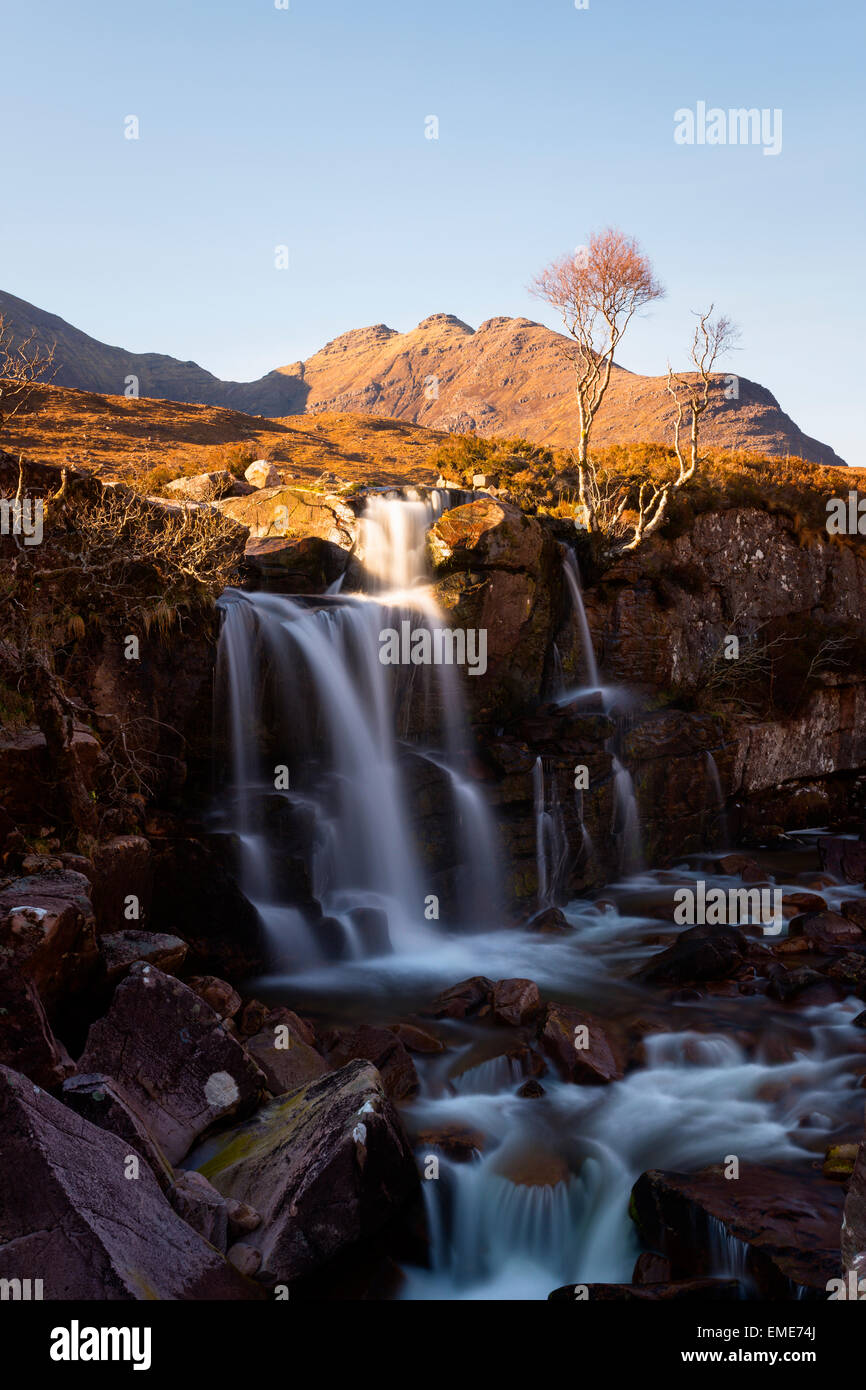 Waterfall at Abhain Coire Mhic Nobuil below he Horns of Beinn Alligin ...