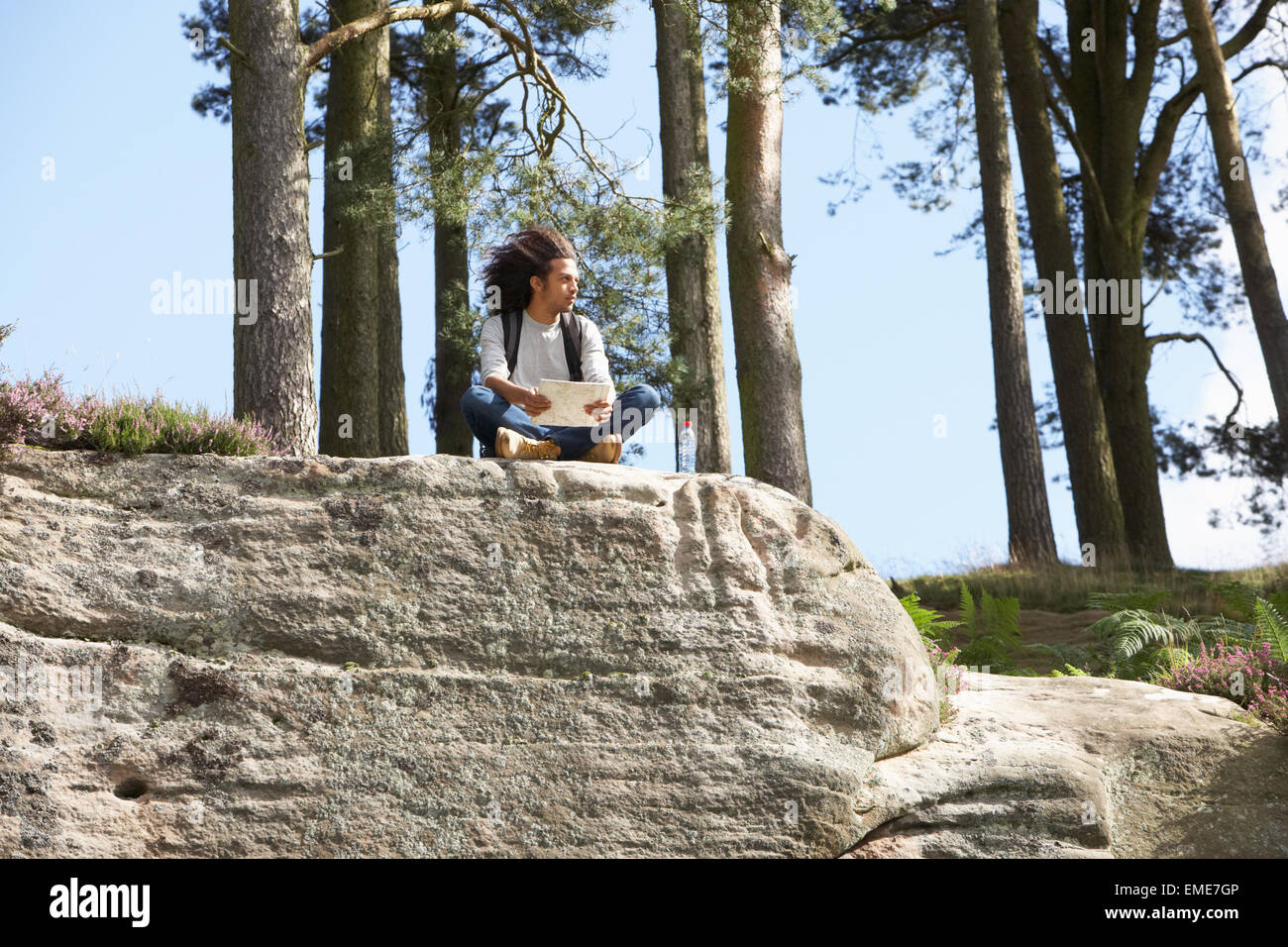 Man Resting During Countryside Hike Stock Photo - Alamy