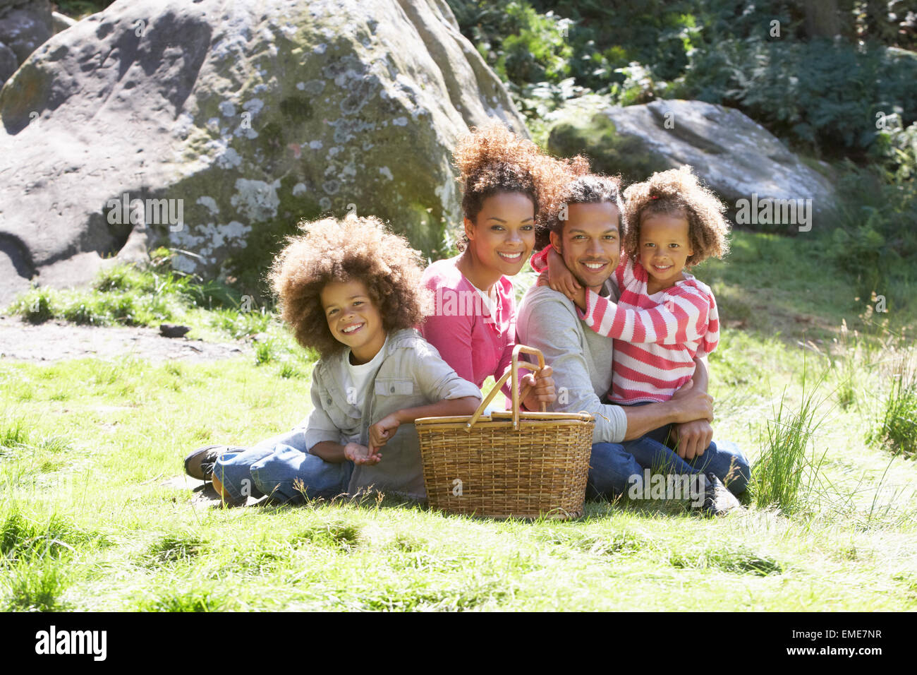 Family Having Picnic In Countryside Stock Photo - Alamy