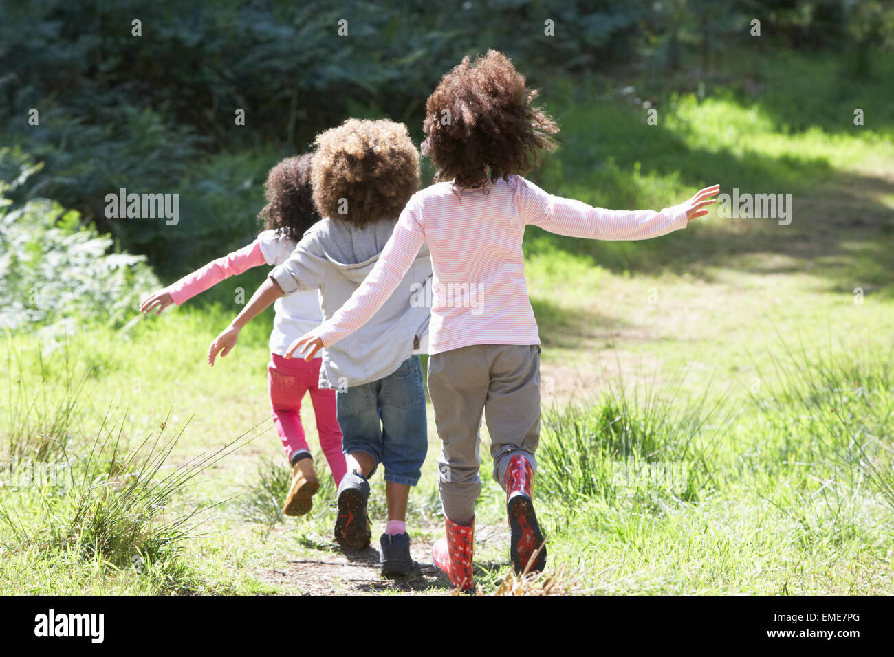 Children playing in the woods hi-res stock photography and images - Alamy