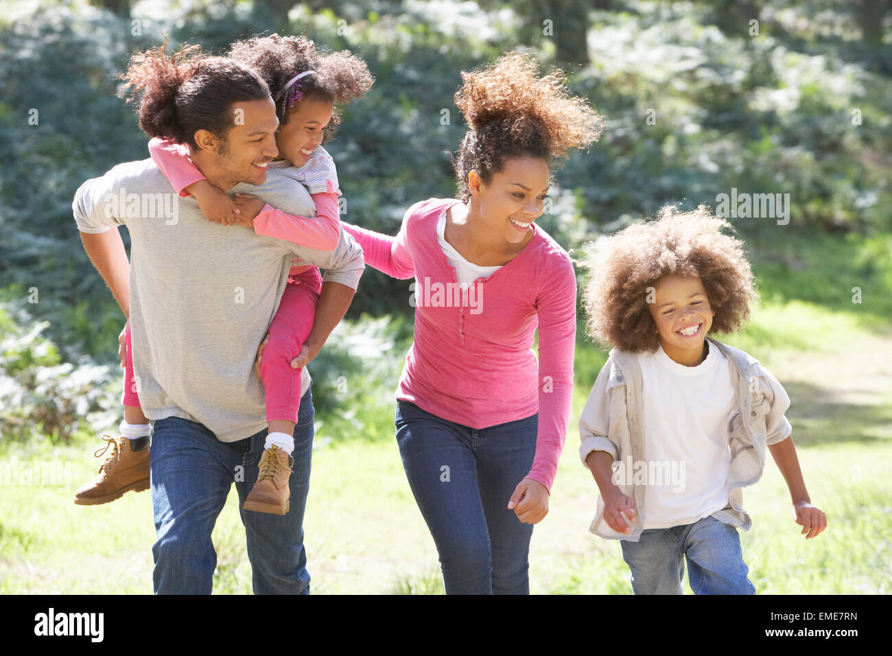 Family Group Walking In Countryside Stock Photo - Alamy