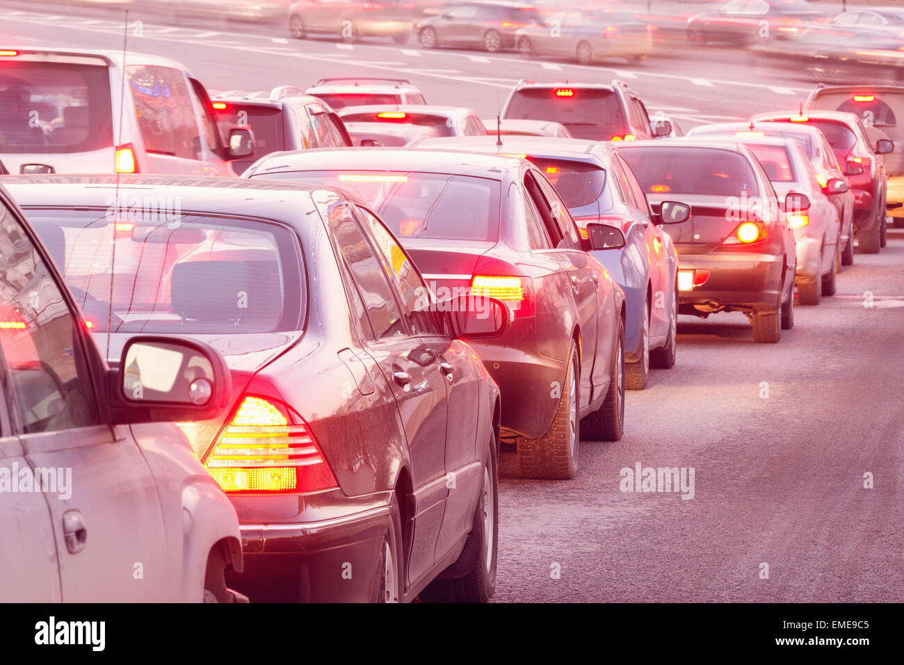 Cars stand before the trafficlight on the central city streets at ...