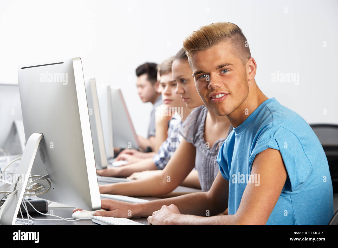 Group Of Students In Computer Class Stock Photo - Alamy