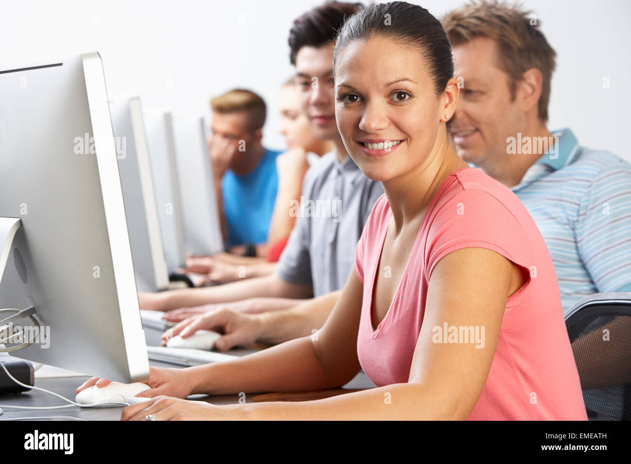 Group Of Students In Computer Class Stock Photo - Alamy