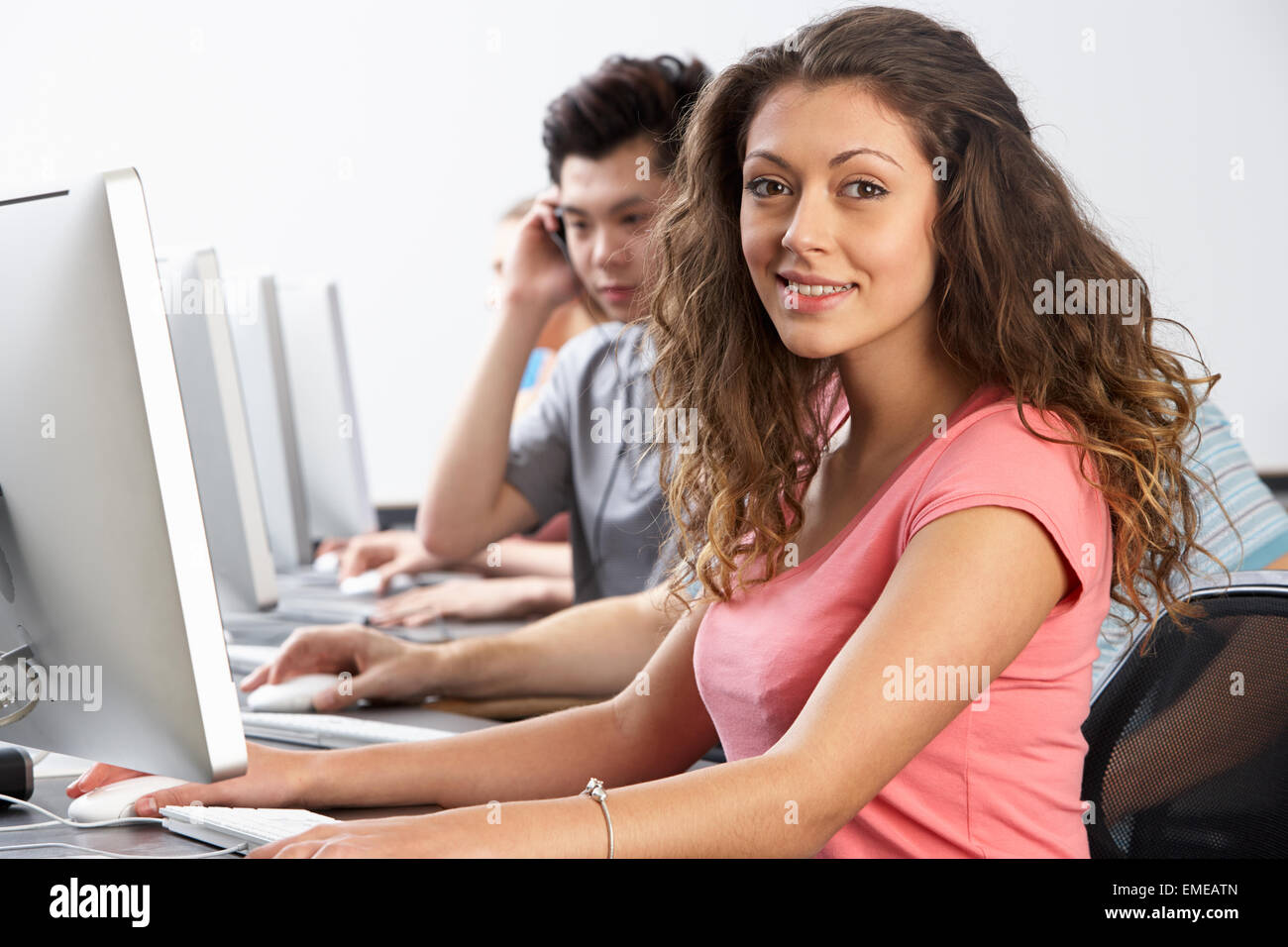 Group Of Students In Computer Class Stock Photo - Alamy