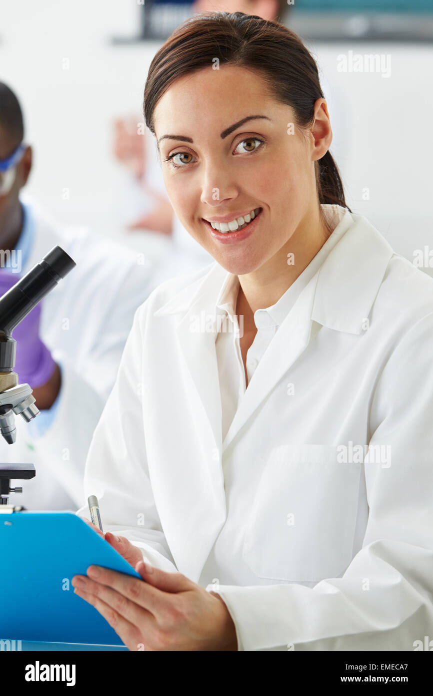Portrait Of Scientist With Clipboard In Laboratory Stock Photo - Alamy