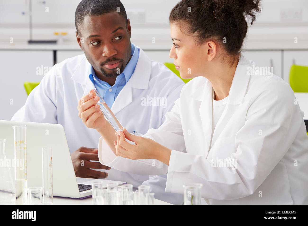 Two Technicians Working In Laboratory Stock Photo - Alamy