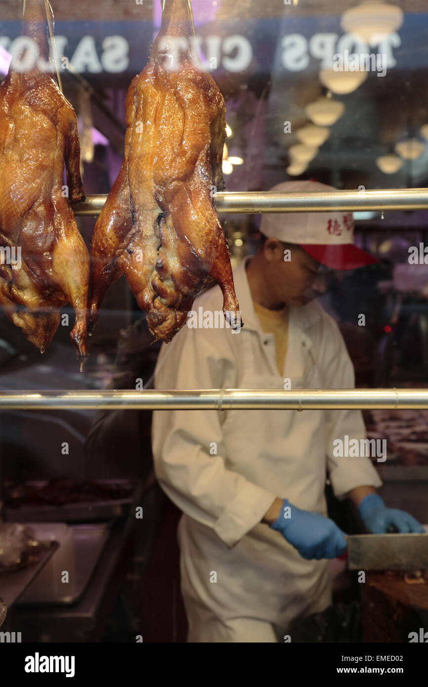 Roasted ducks hanging in window hi-res stock photography and images - Alamy