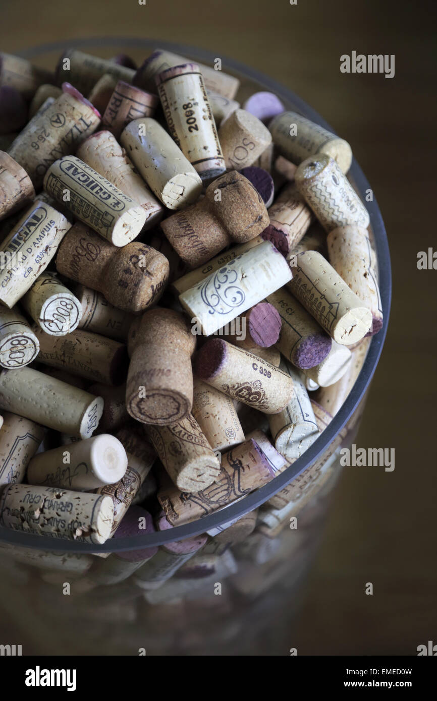 A wine corks collection in a glass container Stock Photo - Alamy