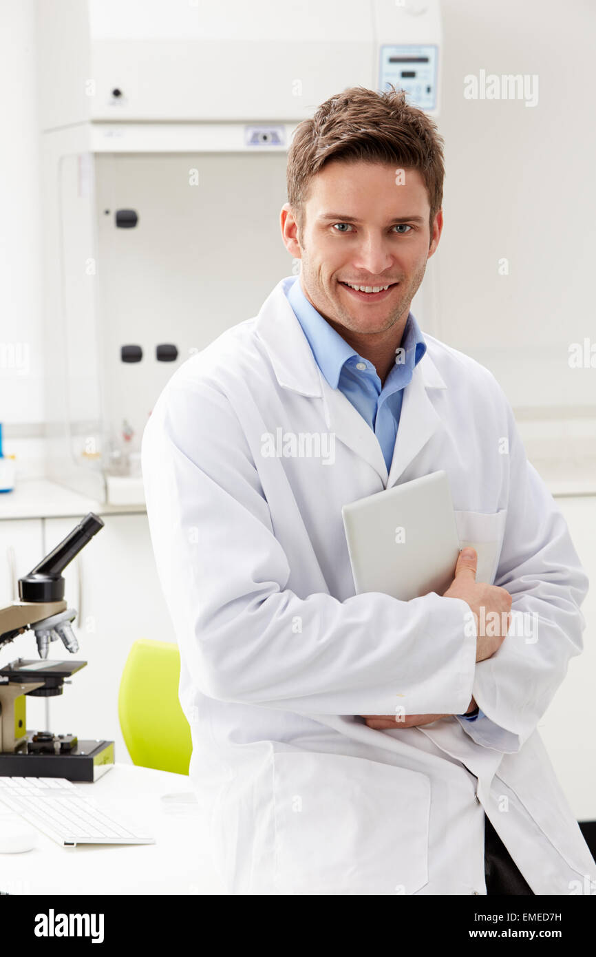 Portrait Of Scientist With Clipboard In Laboratory Stock Photo - Alamy