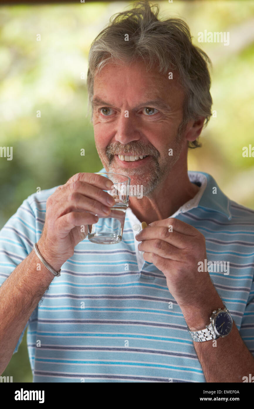 Male glass water taking hi-res stock photography and images - Alamy