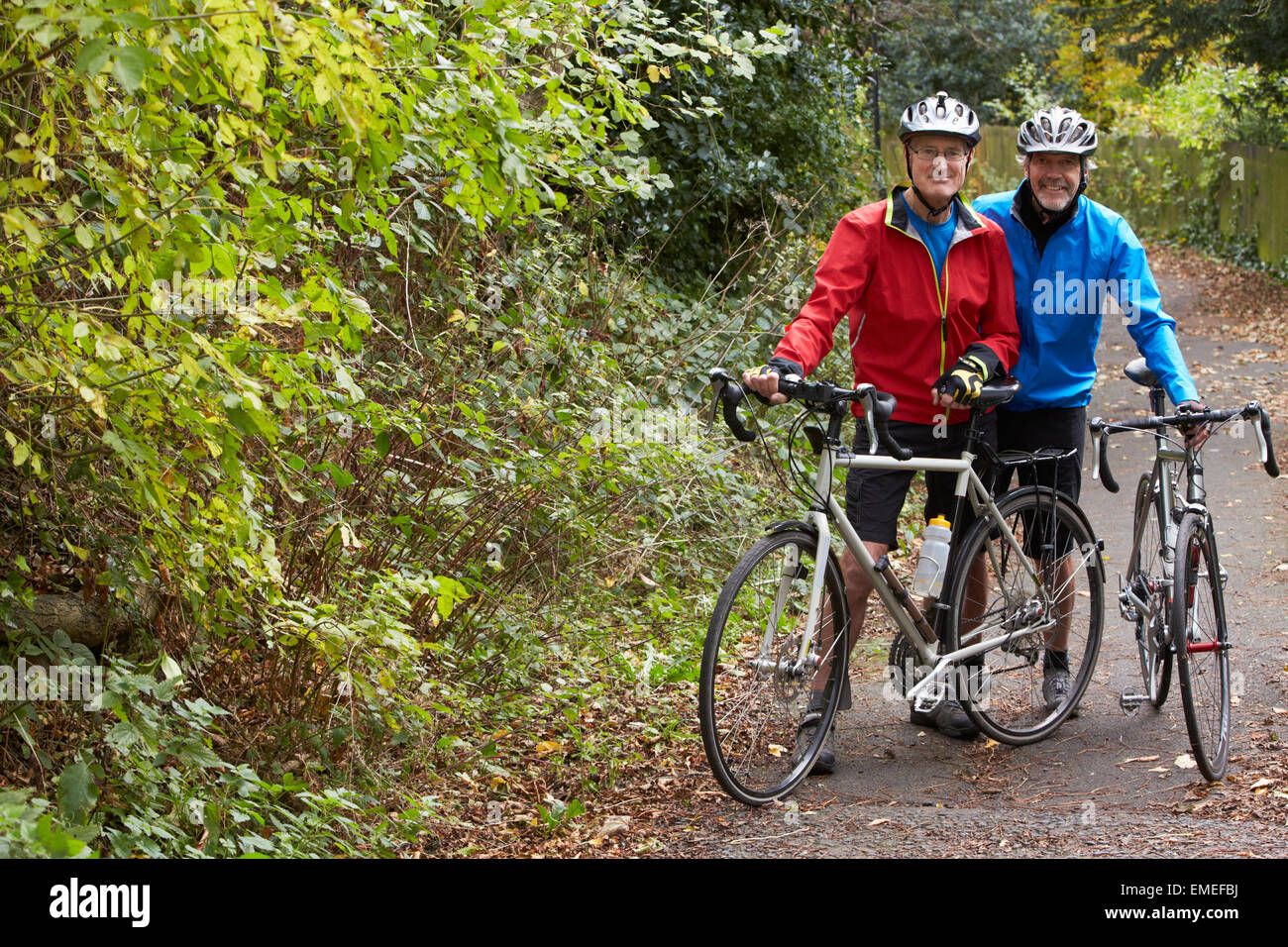 Two man riding bikes hi-res stock photography and images - Alamy