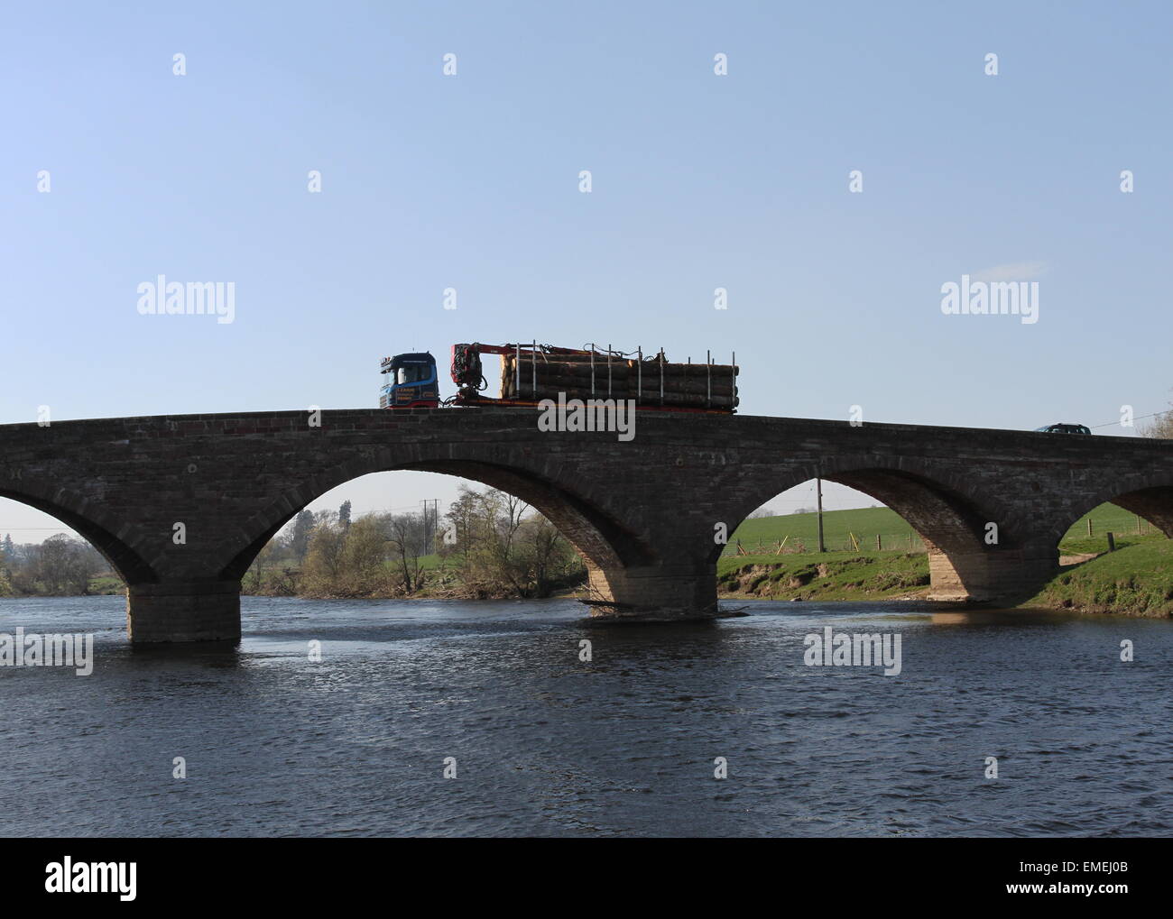Logging truck on Bridge over River Isla Coupar Angus Scotland April ...