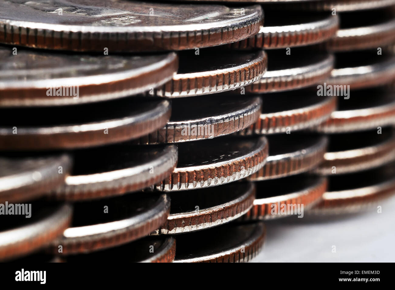Silver coins align in vertical columns, close up Stock Photo - Alamy